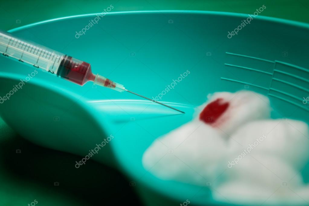 Blood in a syringe — Stock Photo © russellwatkins #55601967