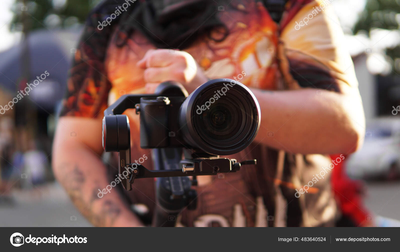A man with a camera and a lens. Photocamera for video shooting. — Stock ...