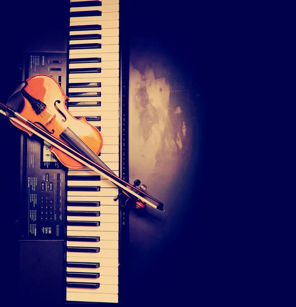 Violin on piano keys Stock Photos, Royalty Free Violin on piano keys ...