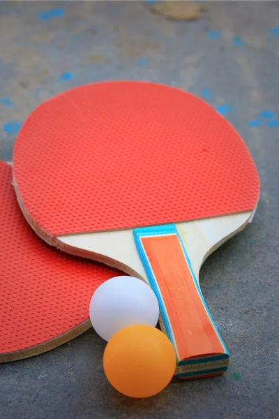 Two table tennis or ping pong rackets and balls on a blue table — Stock ...