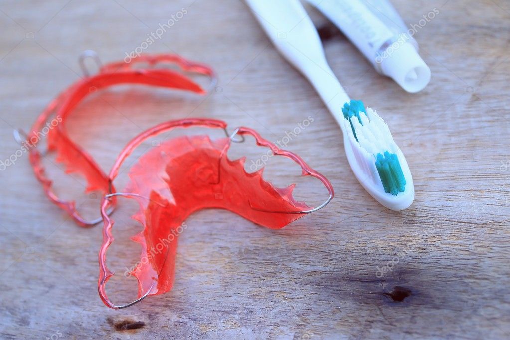 Red retainer wire teeth — Stock Photo © oilslo #117280442
