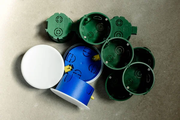 Installation electric box for sockets and wires on concrete background ...