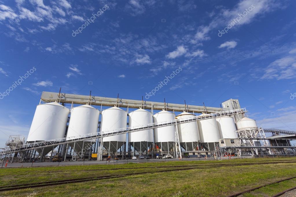 Grain storage tanks Stock Photo by ©wangsong 95034800
