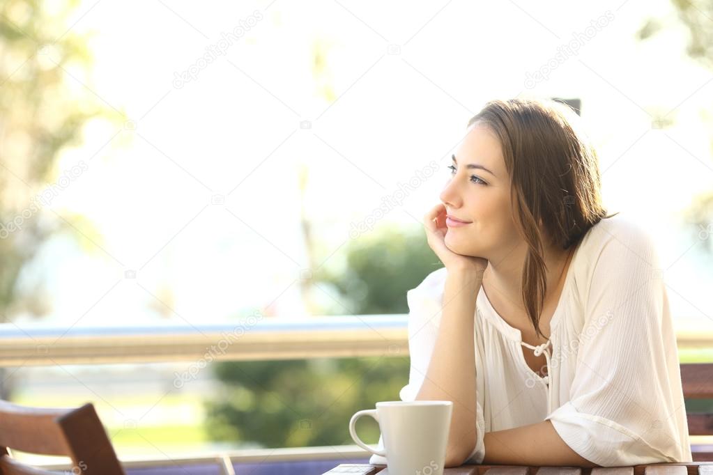 Pensive happy woman remembering Stock Photo by ©AntonioGuillemF 100216422