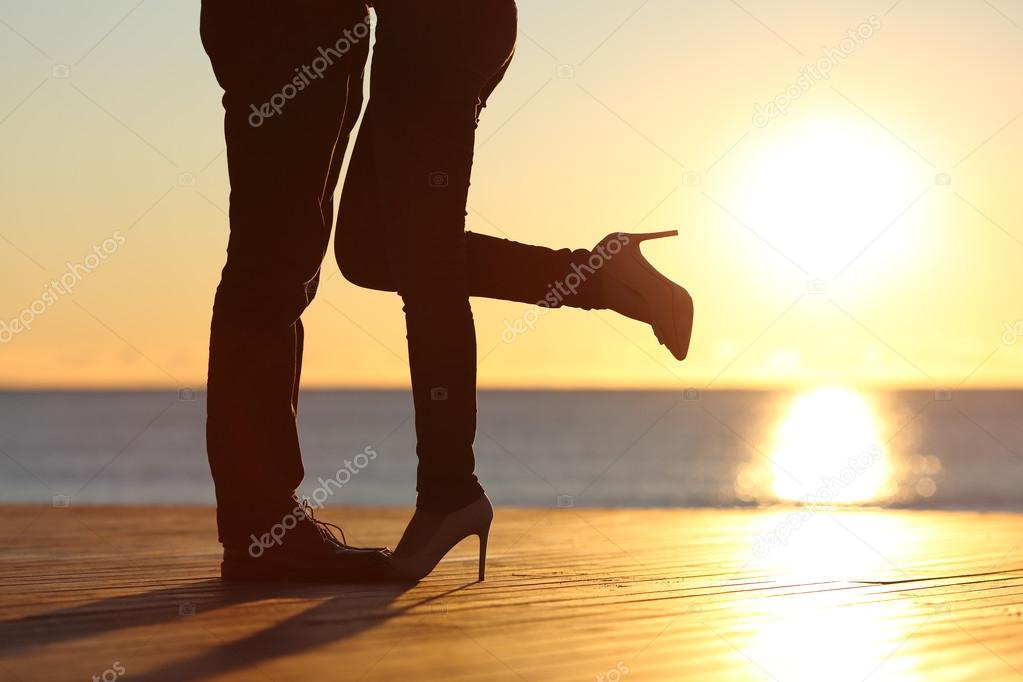 Couple legs hugging in love on the beach — Stock Photo ...