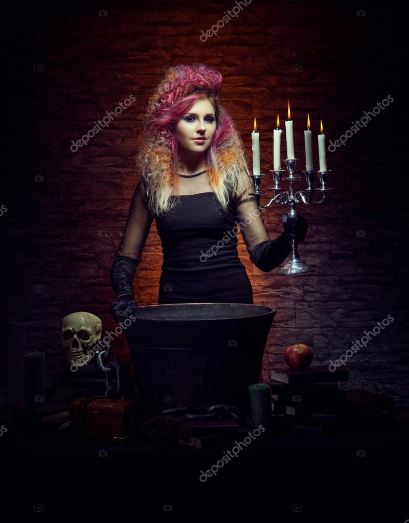 Young and beautiful witch making witchcraft Stock Photo by ©shmeljov ...