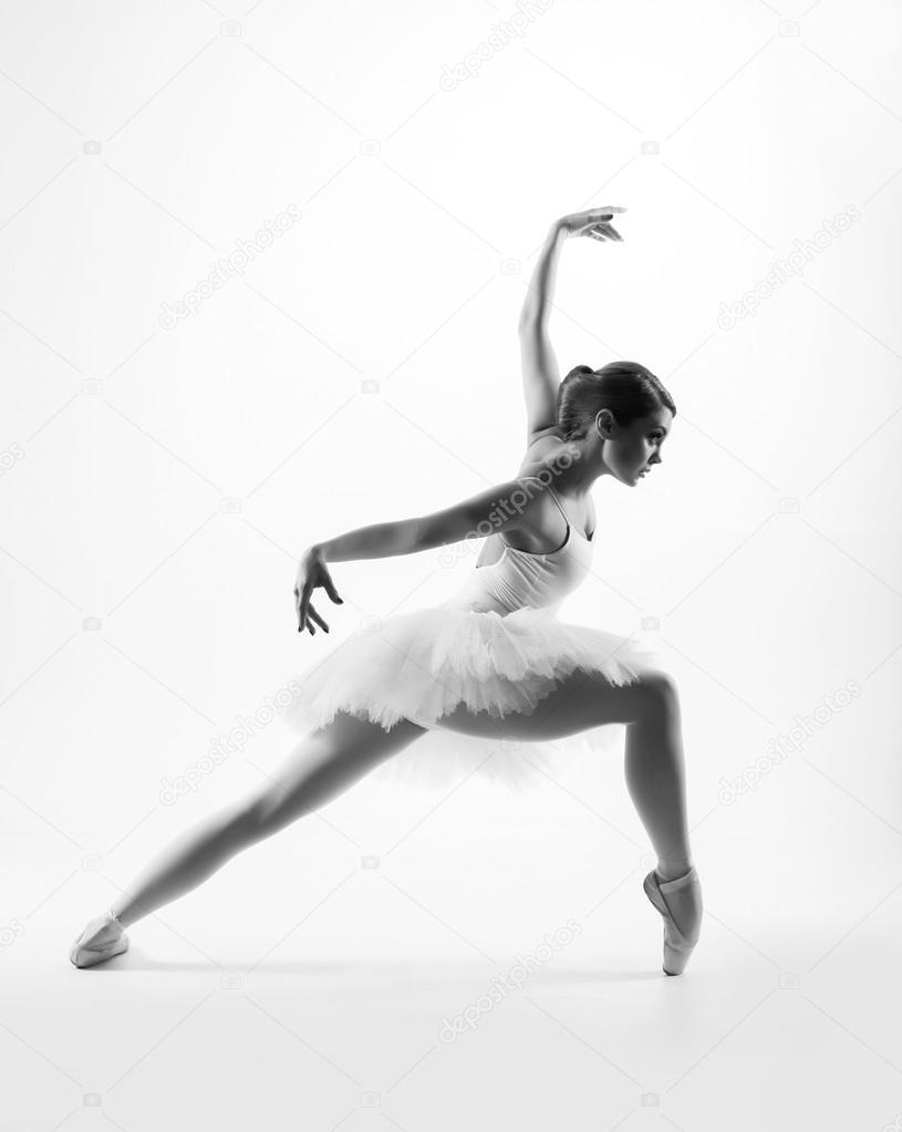 Young female ballet dancer performing a move Stock Photo by ©shmeljov ...