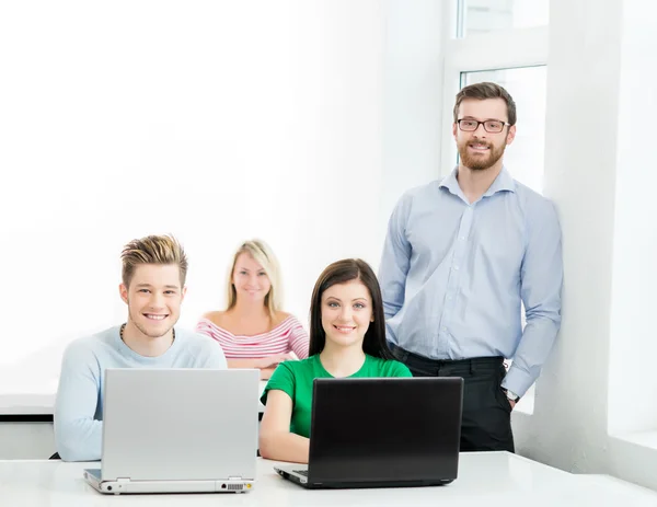 Students at the informatics and programming lesson - Stock Image ...