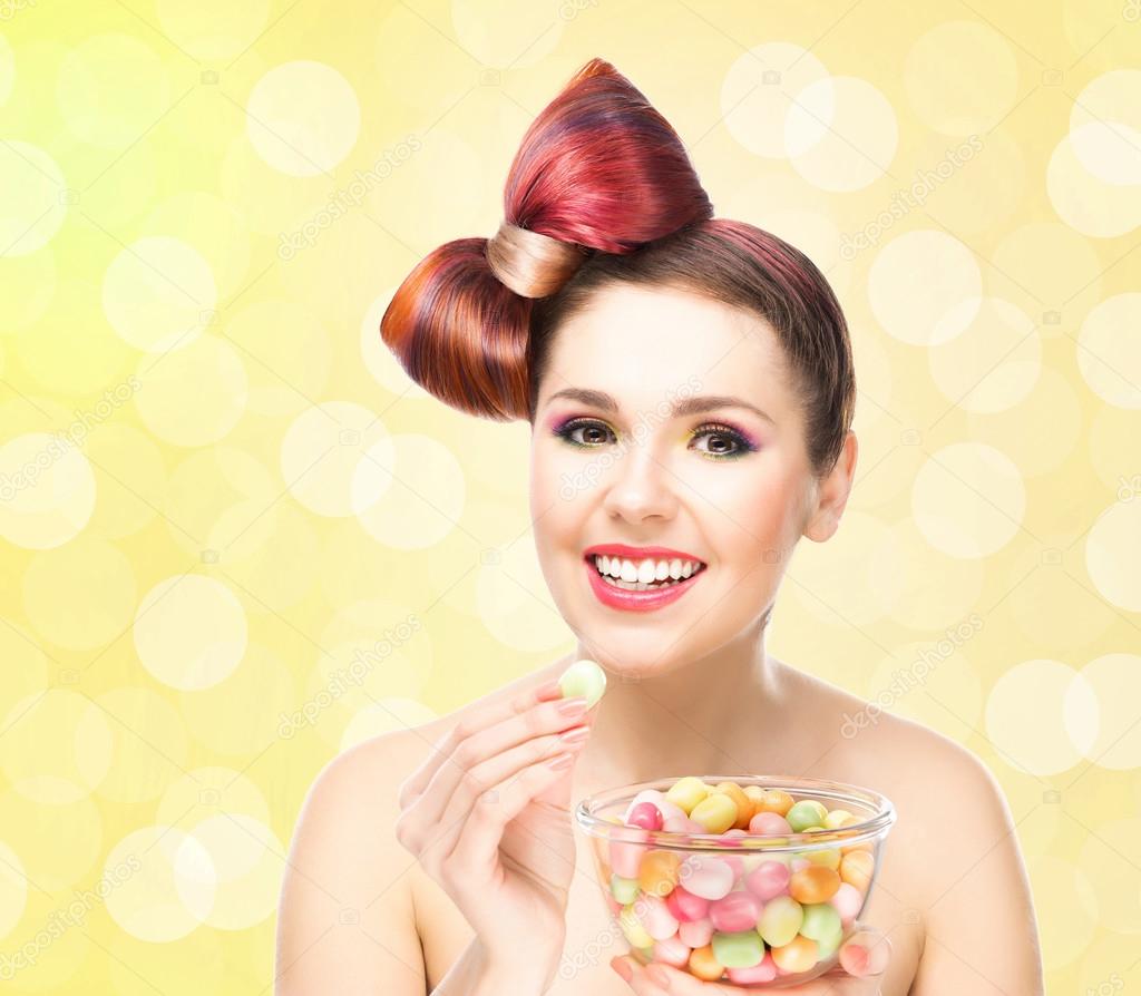 Girl eating sweets from bowl Stock Photo by ©shmeljov 85983552