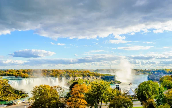 NIAGARA FALLS, CANADA - OCTOBER 26, 2017: A tour boat in the distance ...