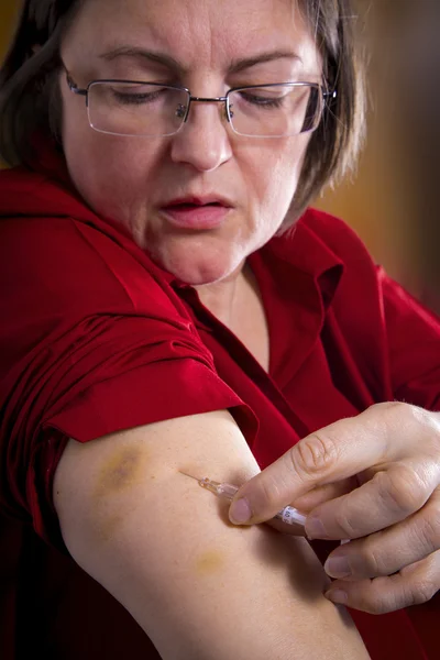 Self injecting intravenous therapy — Free Stock Photo © Hriana #119496018