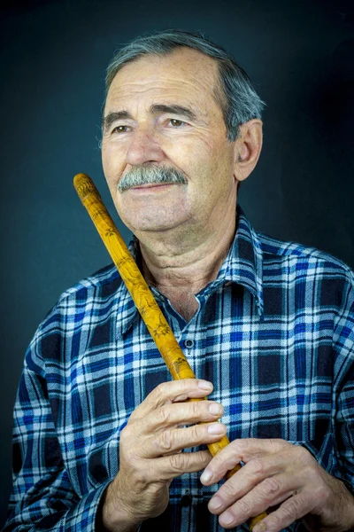 Man playing on pipe flute - Stock Image - Everypixel