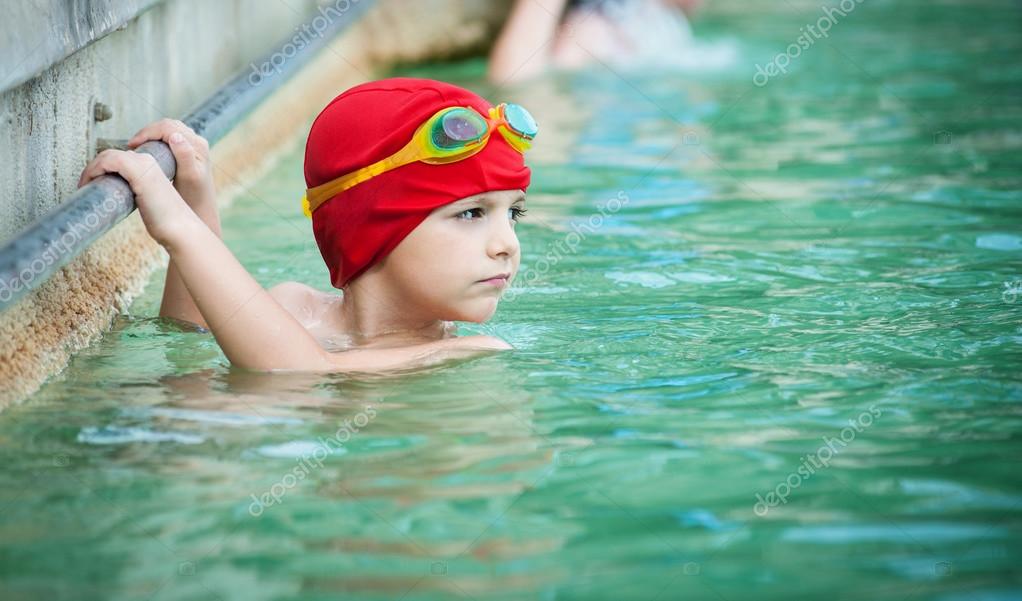 Kid in thermal swimming pool. Stock Photo by ©pio3 56634981