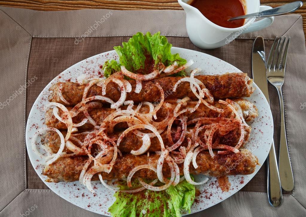 Lamb Kebab with onions and sauce. Georgian cuisine — Stock Photo ...