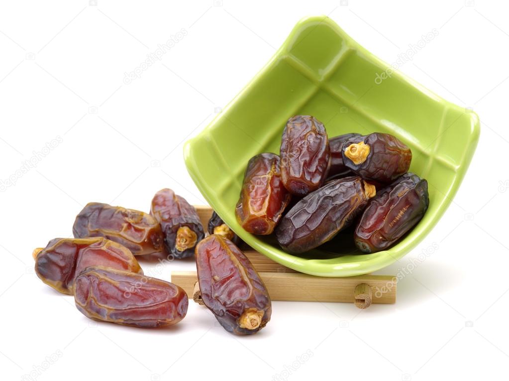 Dates on white backgroundDates on — Stock Photo © jianghongyan #122593382