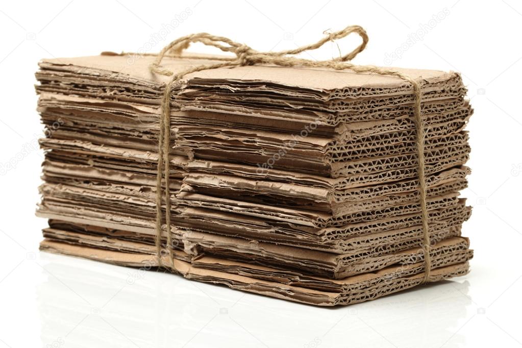 Waste cardboard bundle for recycling Stock Photo by ©jianghongyan 54515025