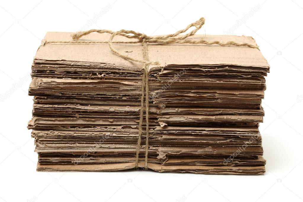 Waste cardboard bundle for recycling Stock Photo by ©jianghongyan 54515031