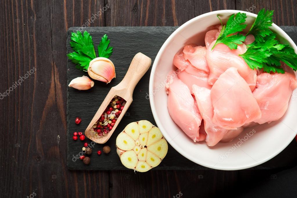 Raw chicken fillet Stock Photo by ©Dragonfly666 92228184