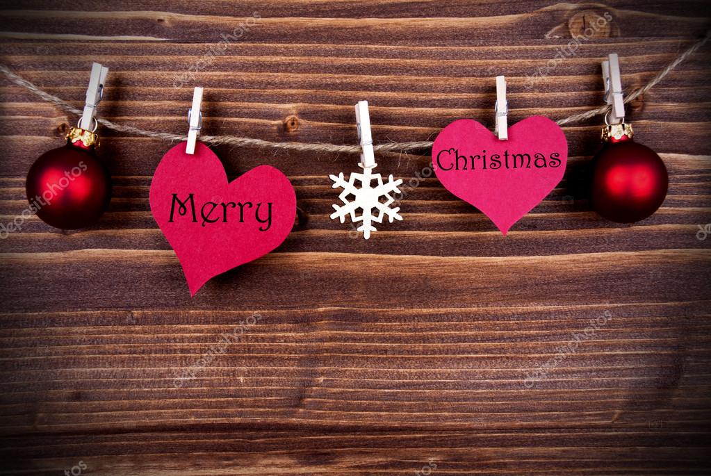 Merry Christmas Greetings on Hearts Stock Photo by ©Nelosa 54107113