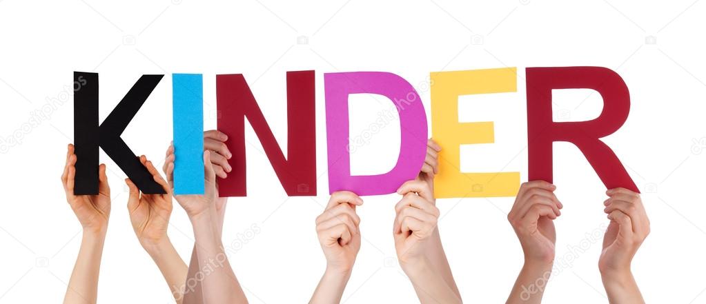People Holding Straight Colorful Word Kinder Means Kids Stock Photo by ...