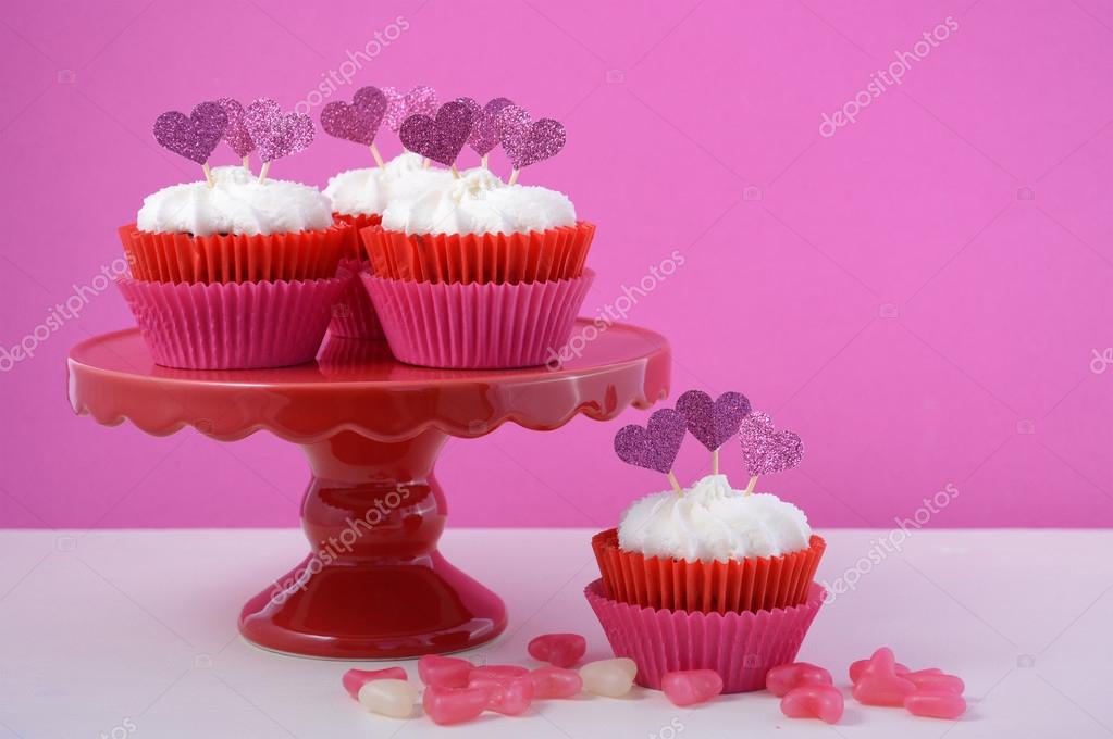 Pink and white cupcakes with heart shape toppers. — Stock Photo ...