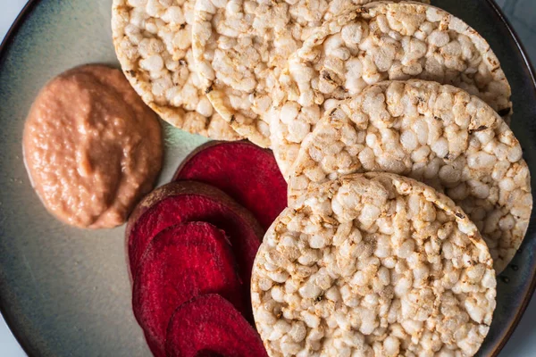 Crispy Puffed Rice Cakes Table Hummus Spread Tomato Vegetables Sesame ...