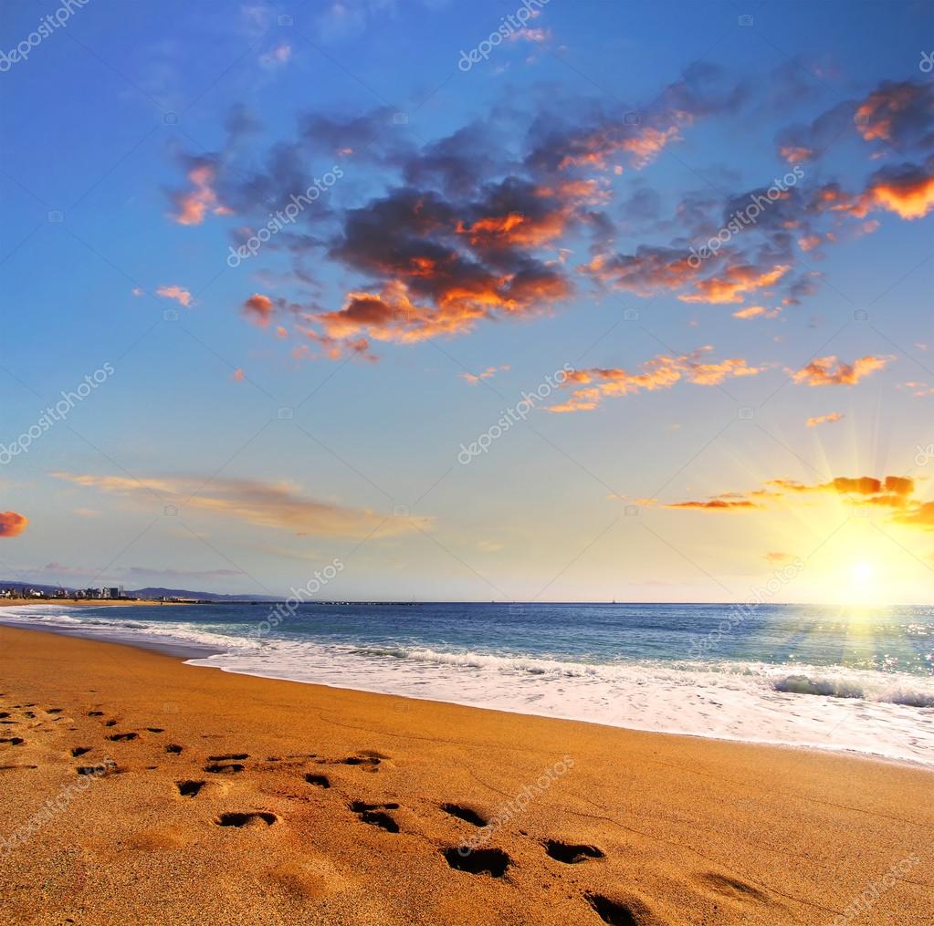 Footsteps In The Sand Sunset