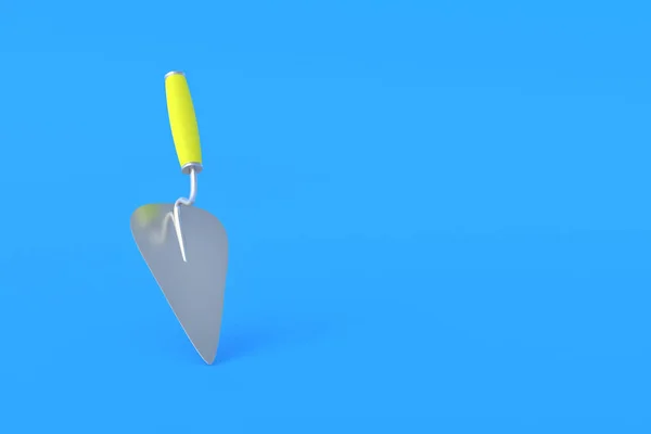 One metal trowel with yellow handle on blue background. Spatula for ...
