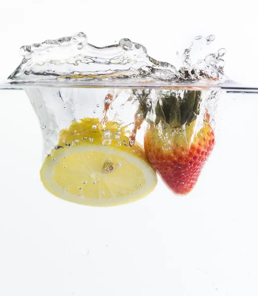 Fruit dropped in the water — Stock Photo © jrp_studio #7472916