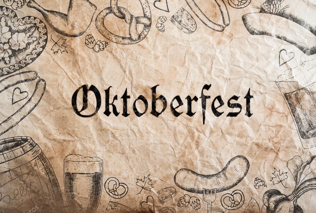 Oktoberfest sign with various hand drawn symbols, paper backgrou ...