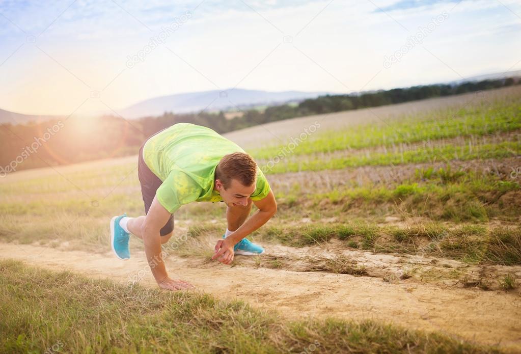 Male runner tripping over and falling down — Stock Photo © halfpoint ...