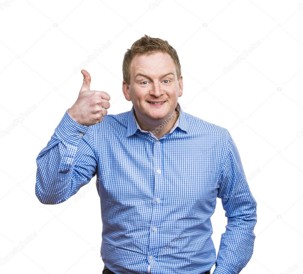 Man gesturing thumb up sign — Stock Photo © halfpoint #64577019