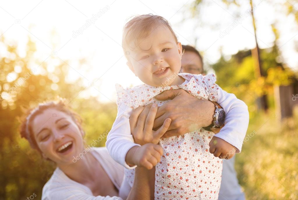 Happy family having fun in spring — Stock Photo © halfpoint #74082807