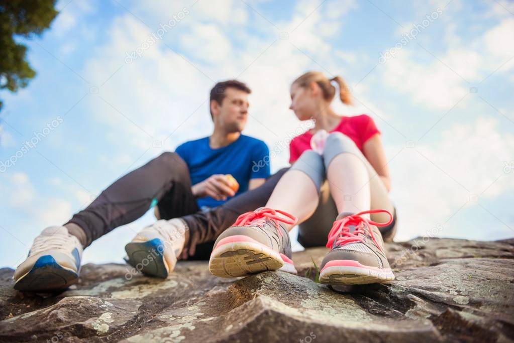 Young runners taking a break Stock Photo by ©halfpoint 76699341