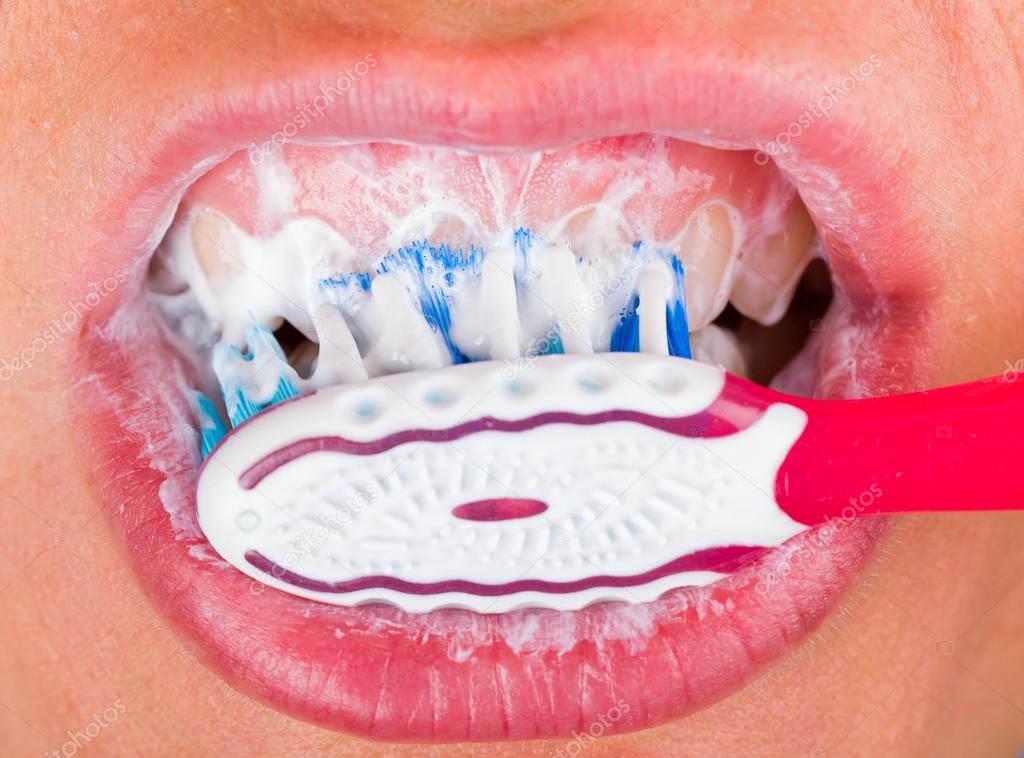 Toothbrushing — Stock Photo © obencem #65930897