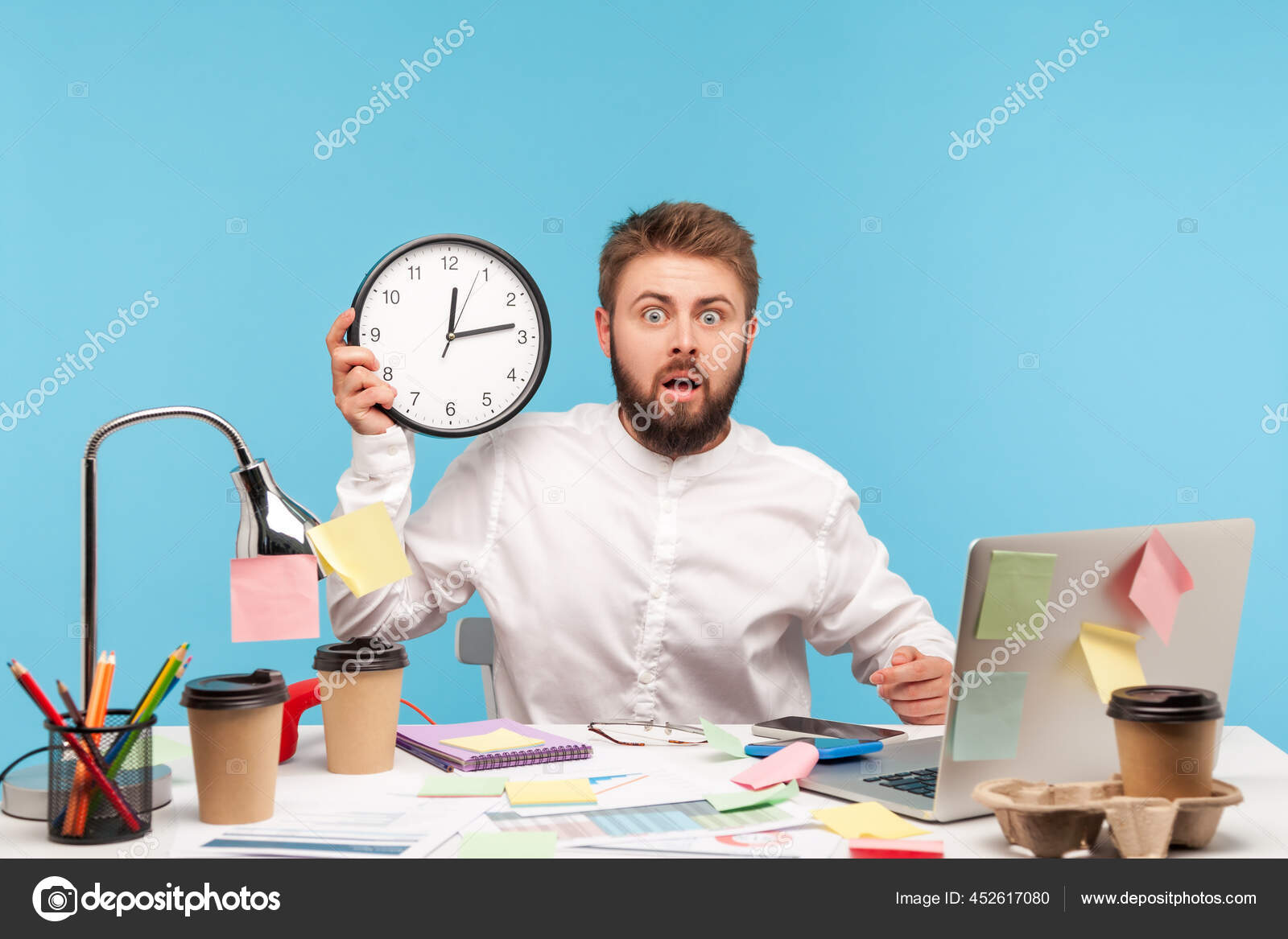 Shocked Man Holding Wall Clock Looking Camera Terrified Expression ...