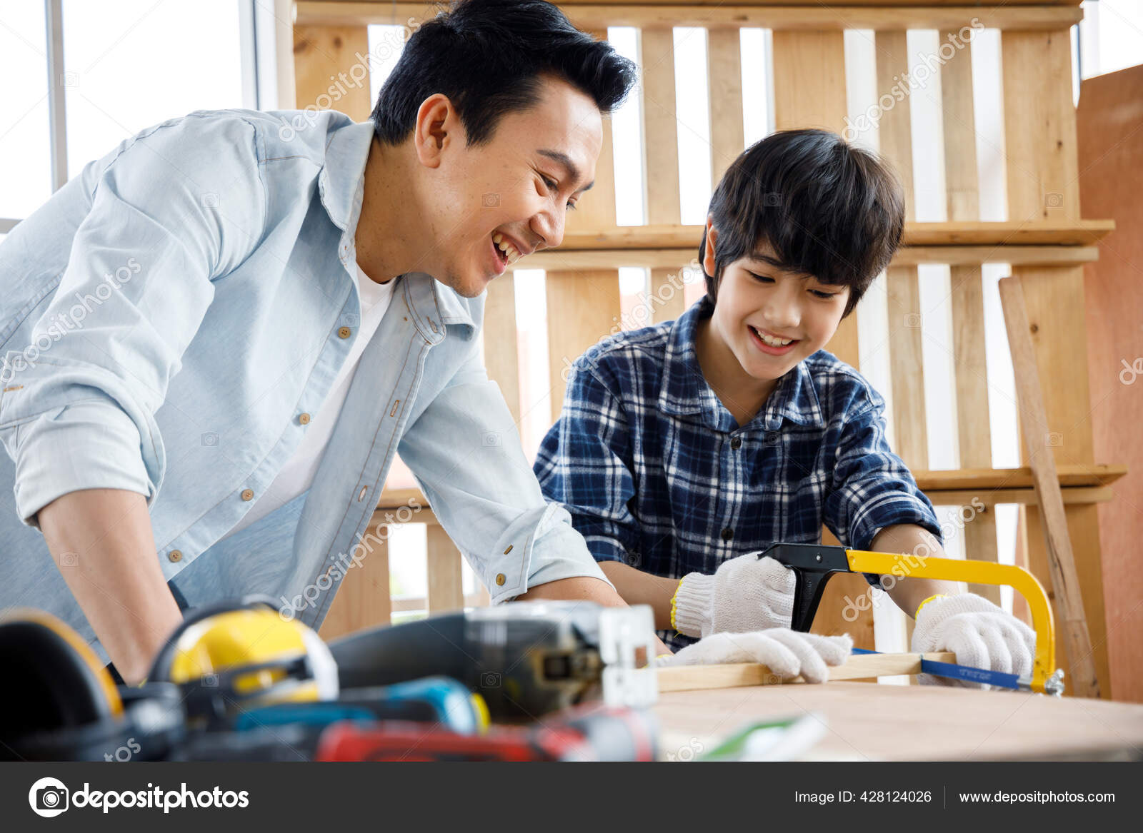 Father Teach Son Using Saw Woodwork Carpentry Workshop Concept Family ...