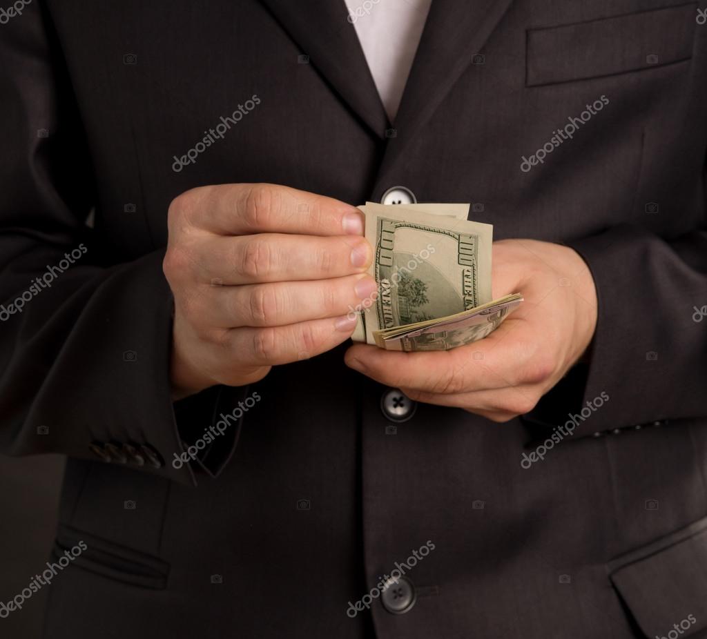 Man counting your money Stock Photo by ©iliyha12 64073761