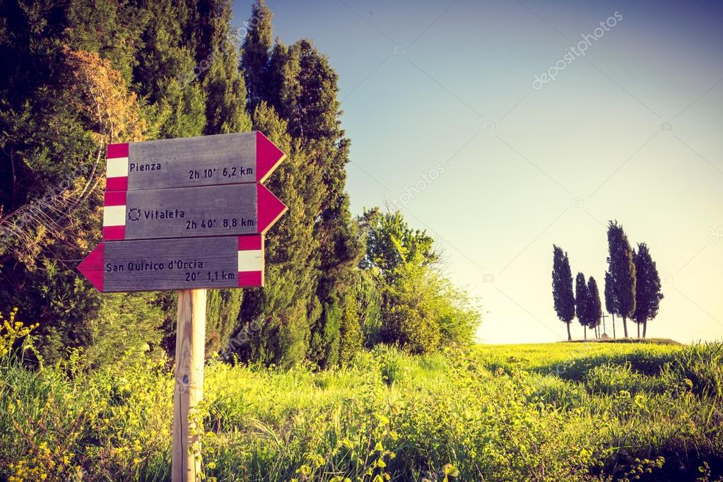 Touristic direction signs with beautiful landscape in Tuscany, Italy ...