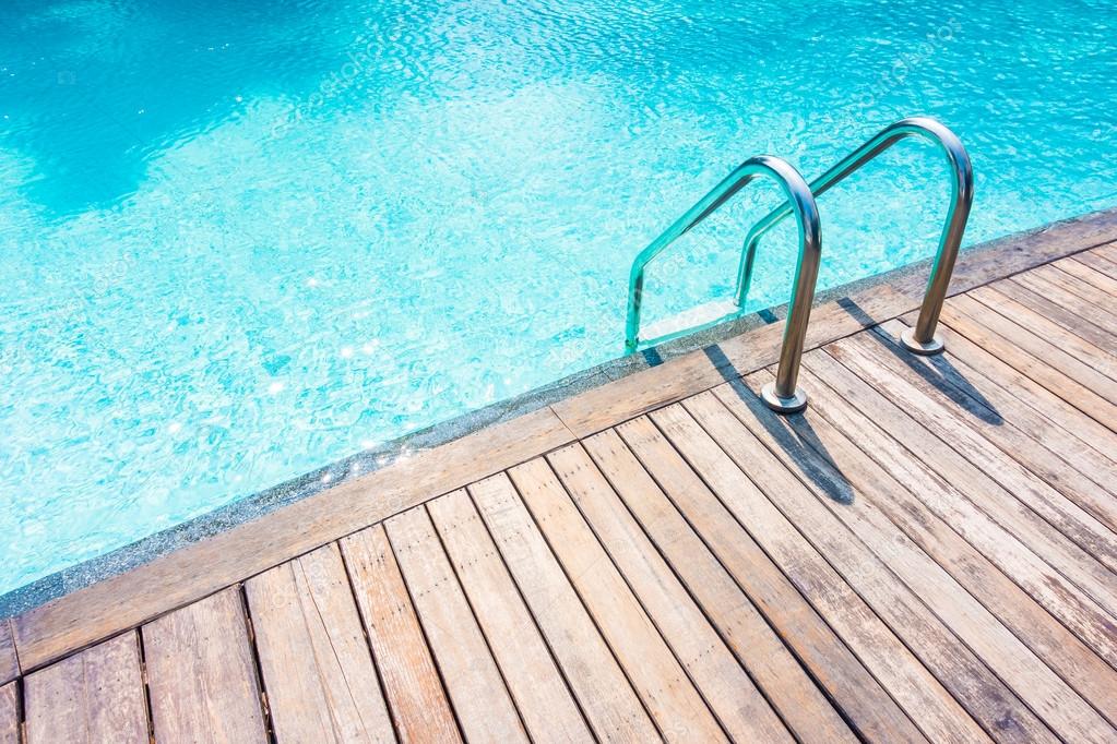 Stairs of swimming pool — Stock Photo © mrsiraphol #100801810