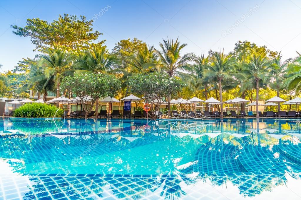 Hotel swimming pool resort Stock Photo by ©mrsiraphol 101674498