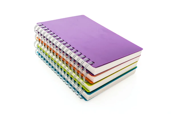 Stack of colorful spiral notebooks isolated on white Stock Photo by ...