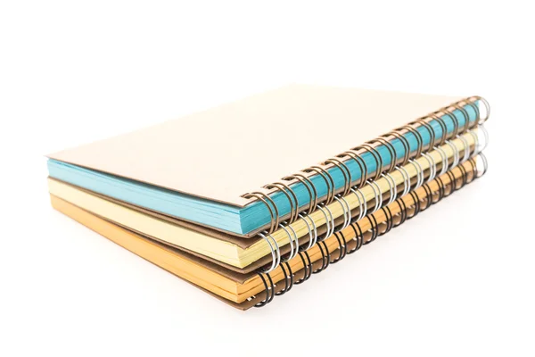 Stack of colorful spiral notebooks isolated on white Stock Photo by ... Stack of colorful spiral notebooks isolated on white Stock Photo by ...