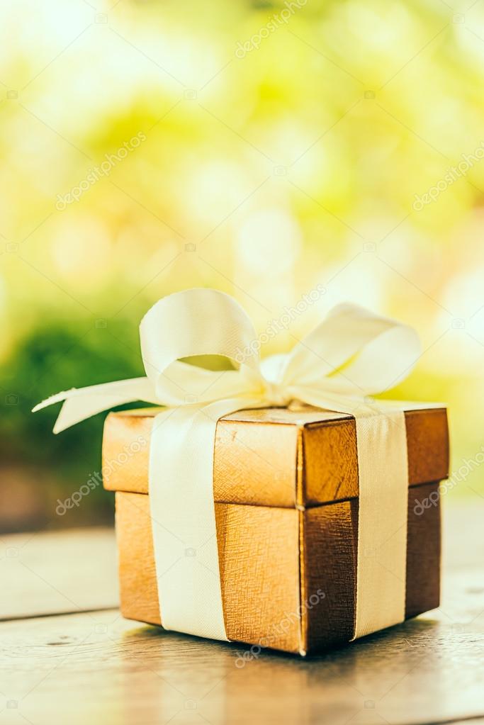 Golden gift box Stock Photo by ©mrsiraphol 61002125