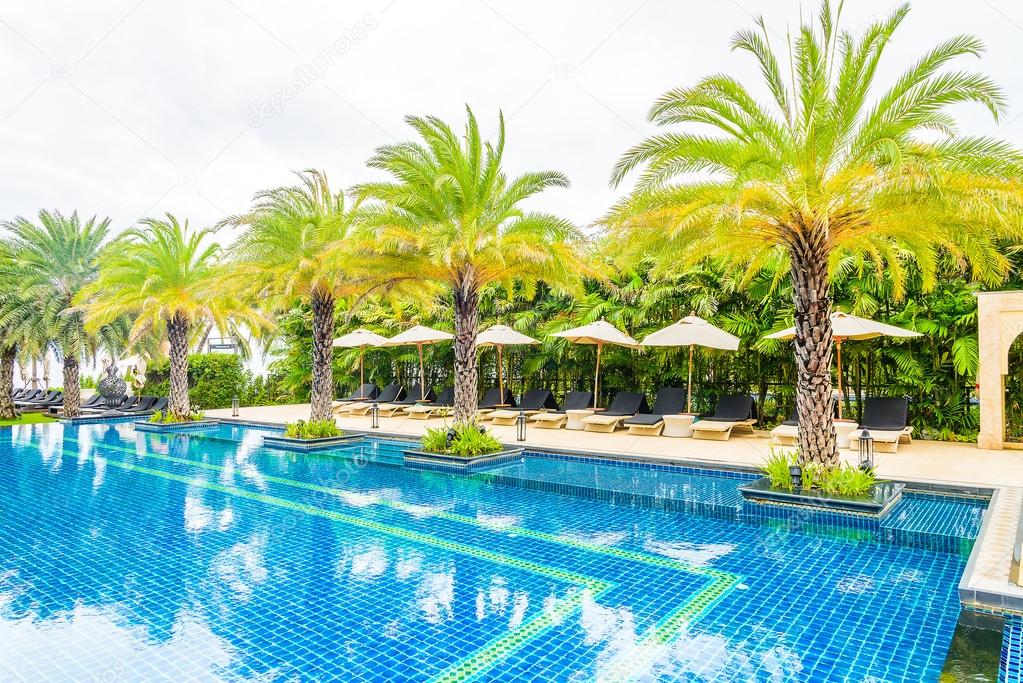 Hotel swimming pool resort Stock Photo by ©mrsiraphol 89751608