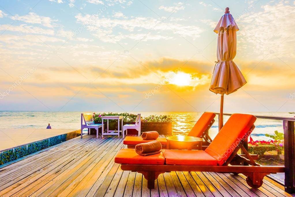 Beautiful luxury Swimming pool resort Stock Photo by ©mrsiraphol 97650164