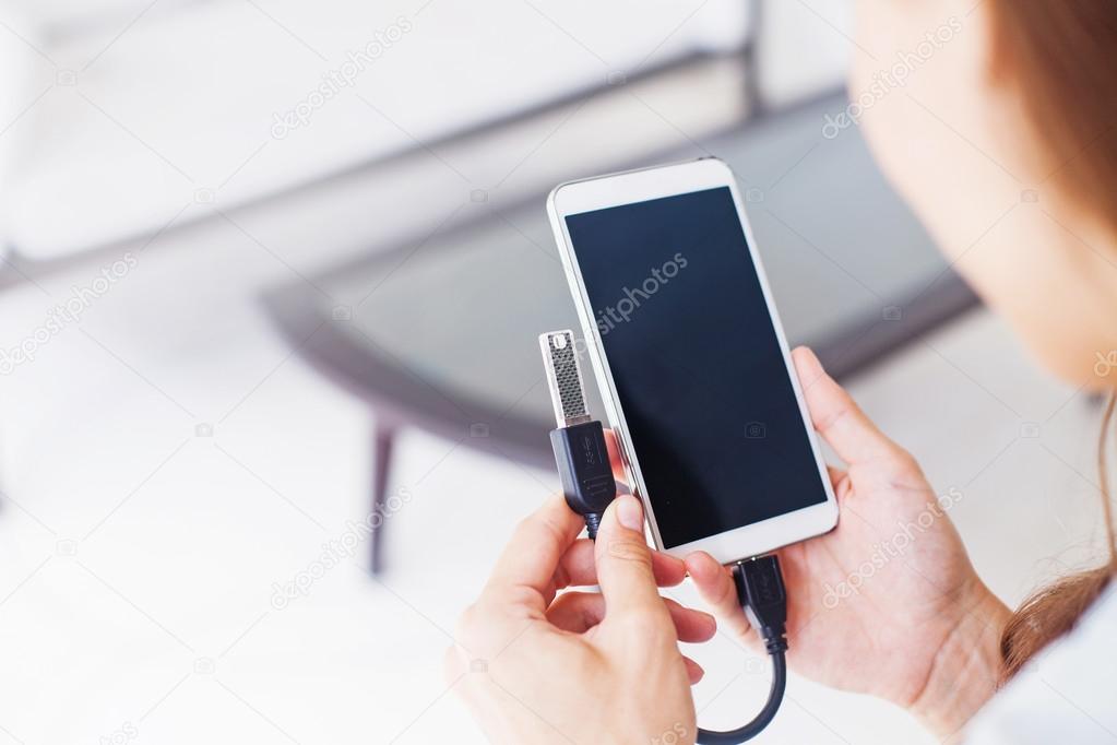 Woman using otg usb with mobile phone — Stock Photo © apid #89607064 Woman using otg usb with mobile phone — Stock Photo © apid #89607064