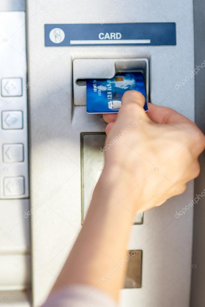Cash withdrawals at ATM — Stock Photo © Geribody #85771800