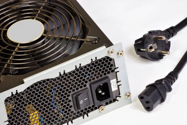 The computer's power supply and network cable. For supplying the ...