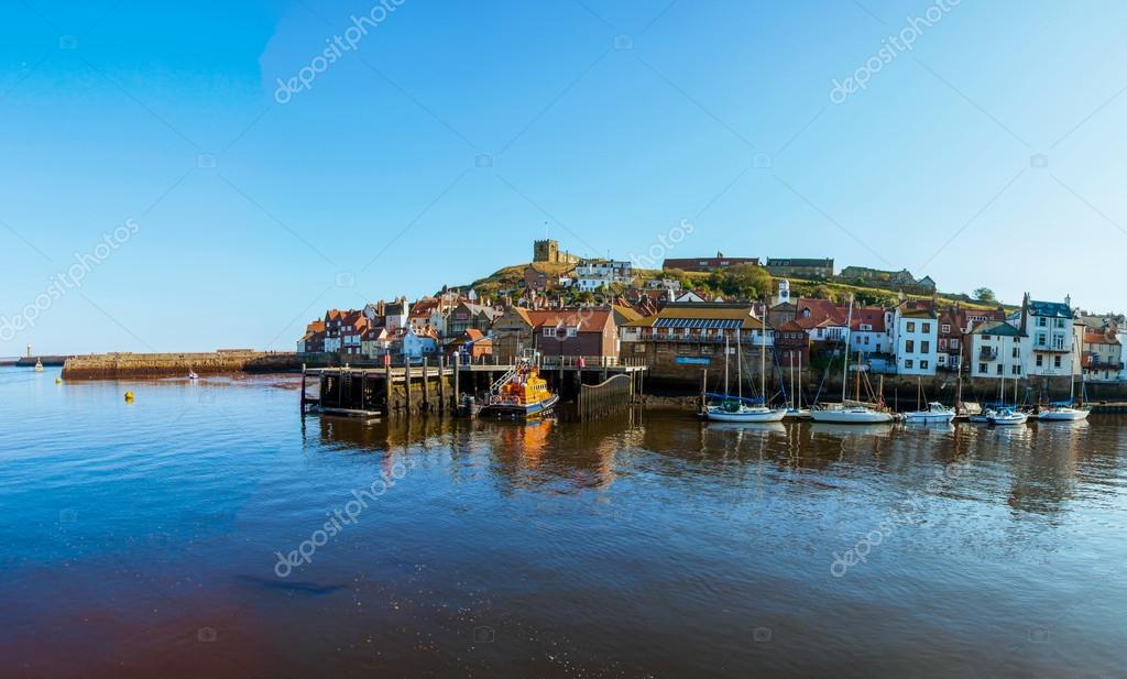 Scenic view of Whitby city and abbey in sunny autumn day in North ...